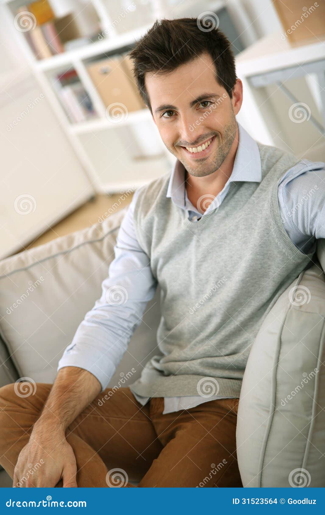 Happy Man Sitting in Sofa at Home Stock Photo - Image of caucasian ...