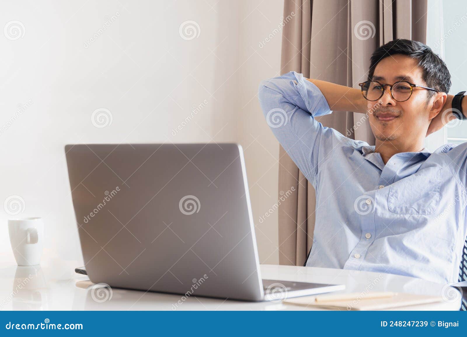 Happy Man Smiling while Working on Laptop at Home. Stock Image - Image ...