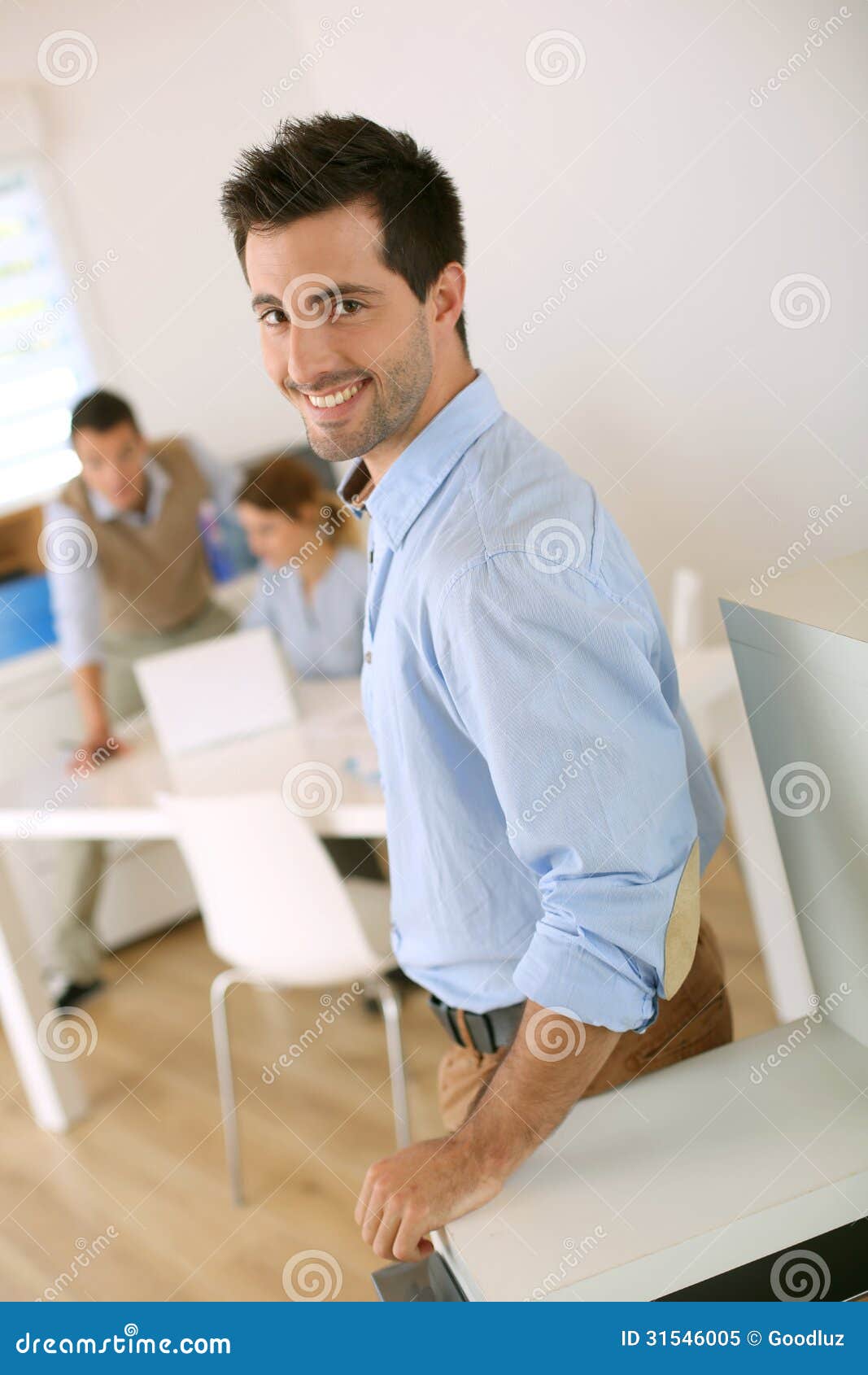 Happy Man Standing in Office Stock Image - Image of casual, friendly ...