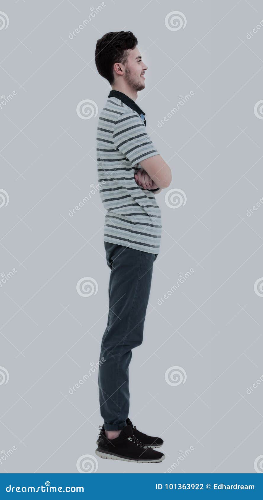 Young Man Standing Sideways Isolated on White Background Stock Photo ... Young Man Standing Sideways Isolated on White Background Stock Photo ...