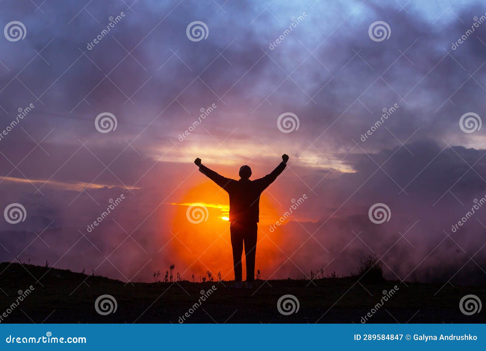 Happy man on sunset stock image. Image of mountains - 289584847
