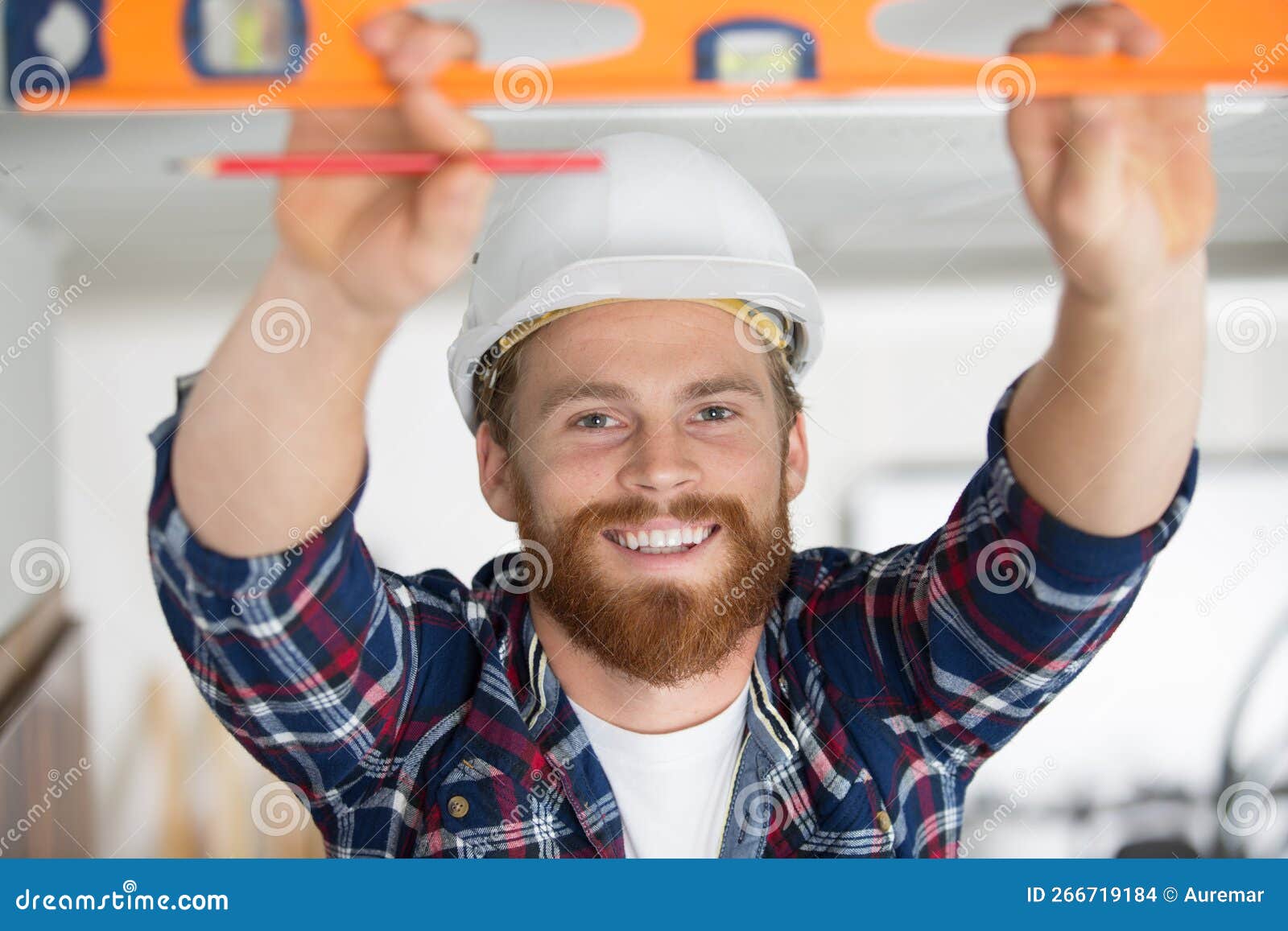 Happy Man Taking Measures with Spirit Level Stock Photo - Image of ...