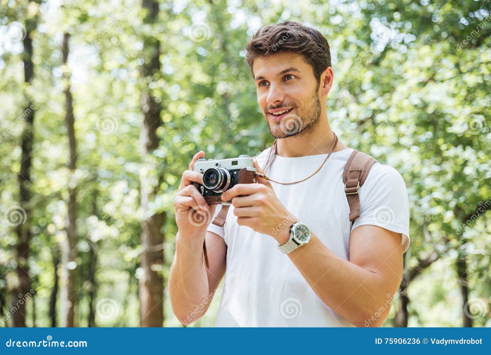 Happy Man Taking Pictures with Old Photo Camera in Forest Stock Photo ...
