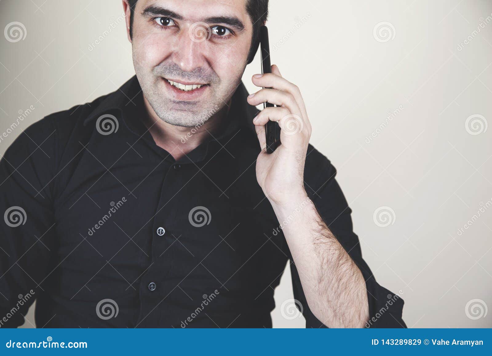 Happy man talking in phone stock image. Image of mobile - 143289829