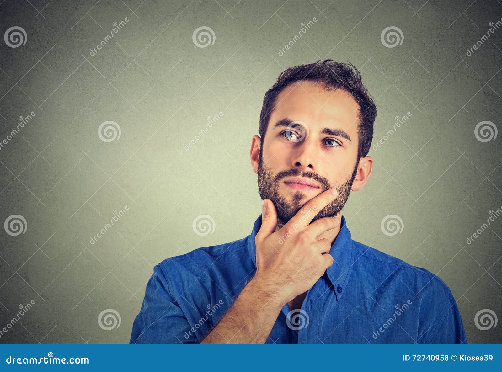 Happy Man Thinking Daydreaming Looking Up Isolated on Gray Wall ...