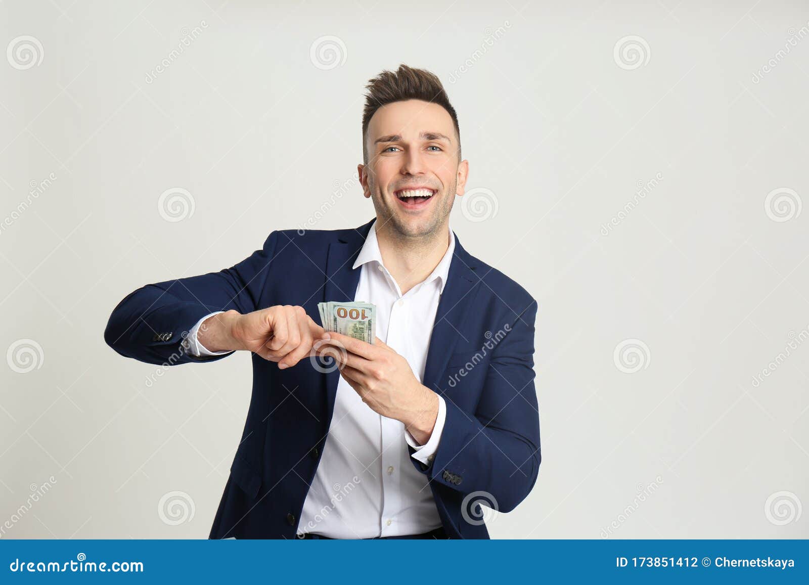 Happy Man Throwing Money on Light Grey Background Stock Photo - Image ...