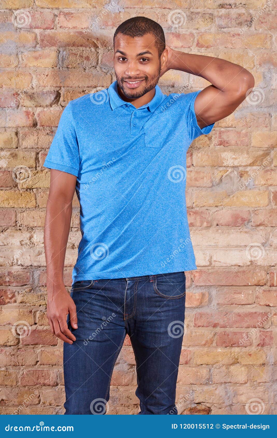 Happy man in a tshirt stock photo. Image of muscles - 120015512
