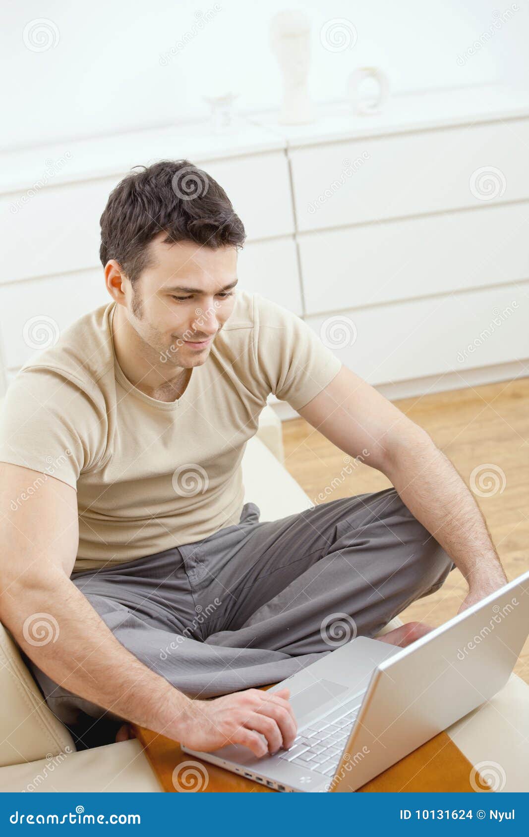 Happy man using computer stock photo. Image of happy - 10131624
