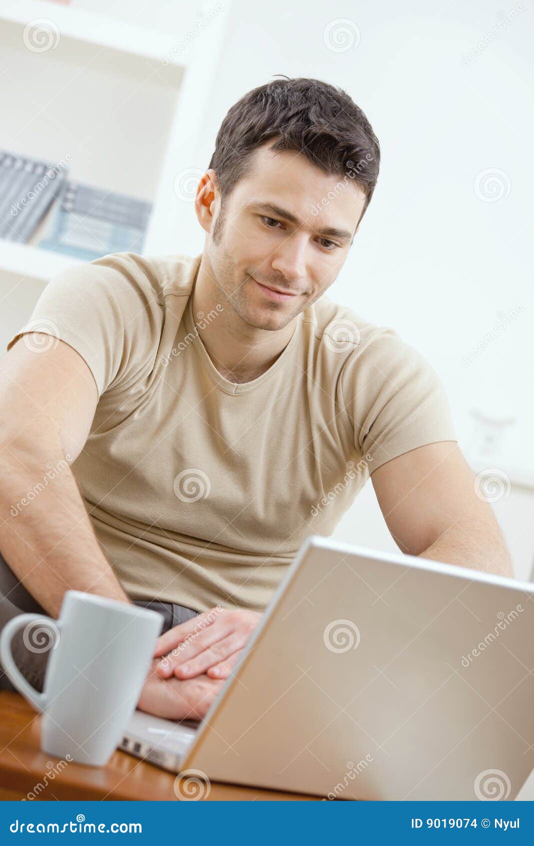 Happy man using computer stock photo. Image of career - 9019074