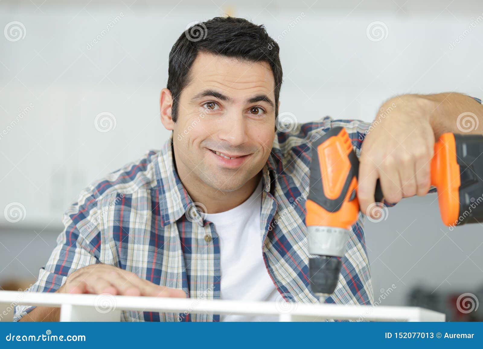 Happy Man Using Drill at Home Stock Image - Image of drilling, house ...