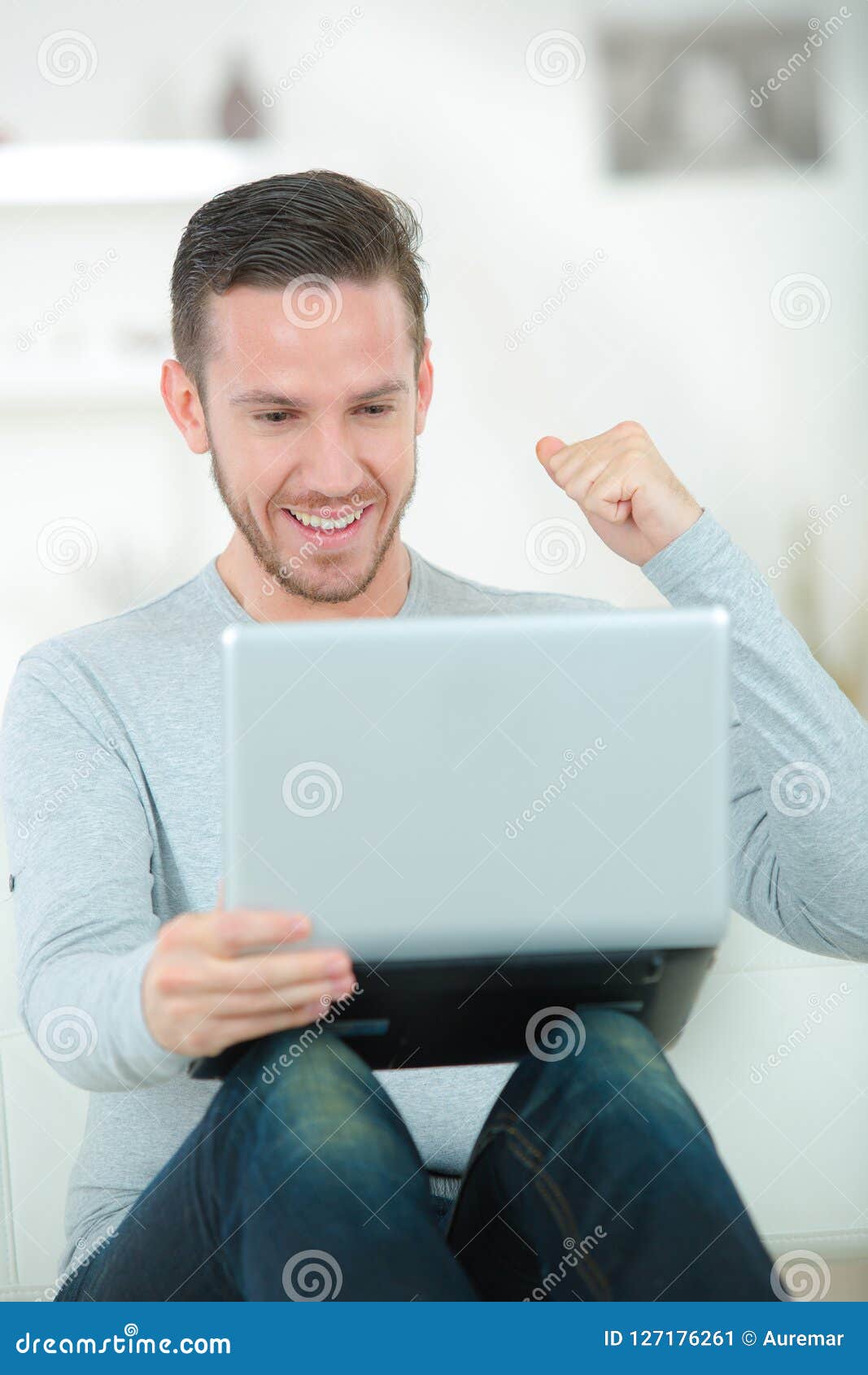Happy man using laptop stock image. Image of portrait - 127176261