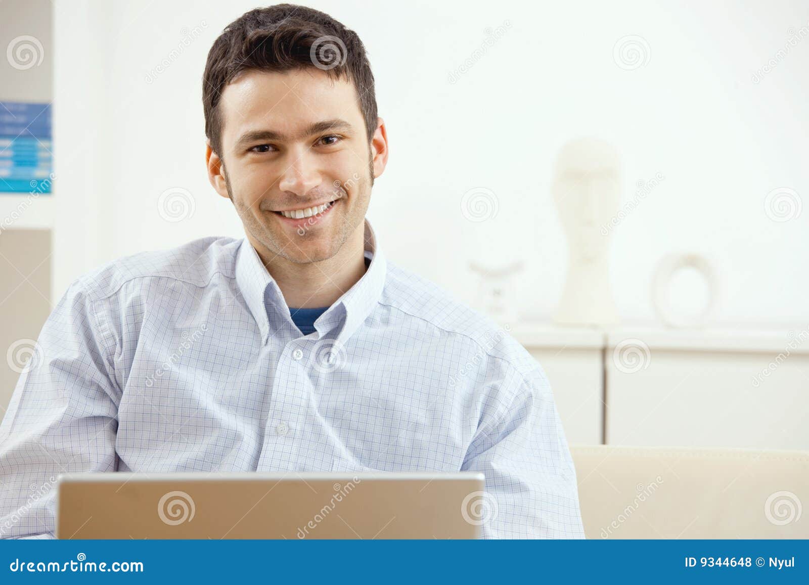 Happy man using laptop stock photo. Image of internet - 9344648