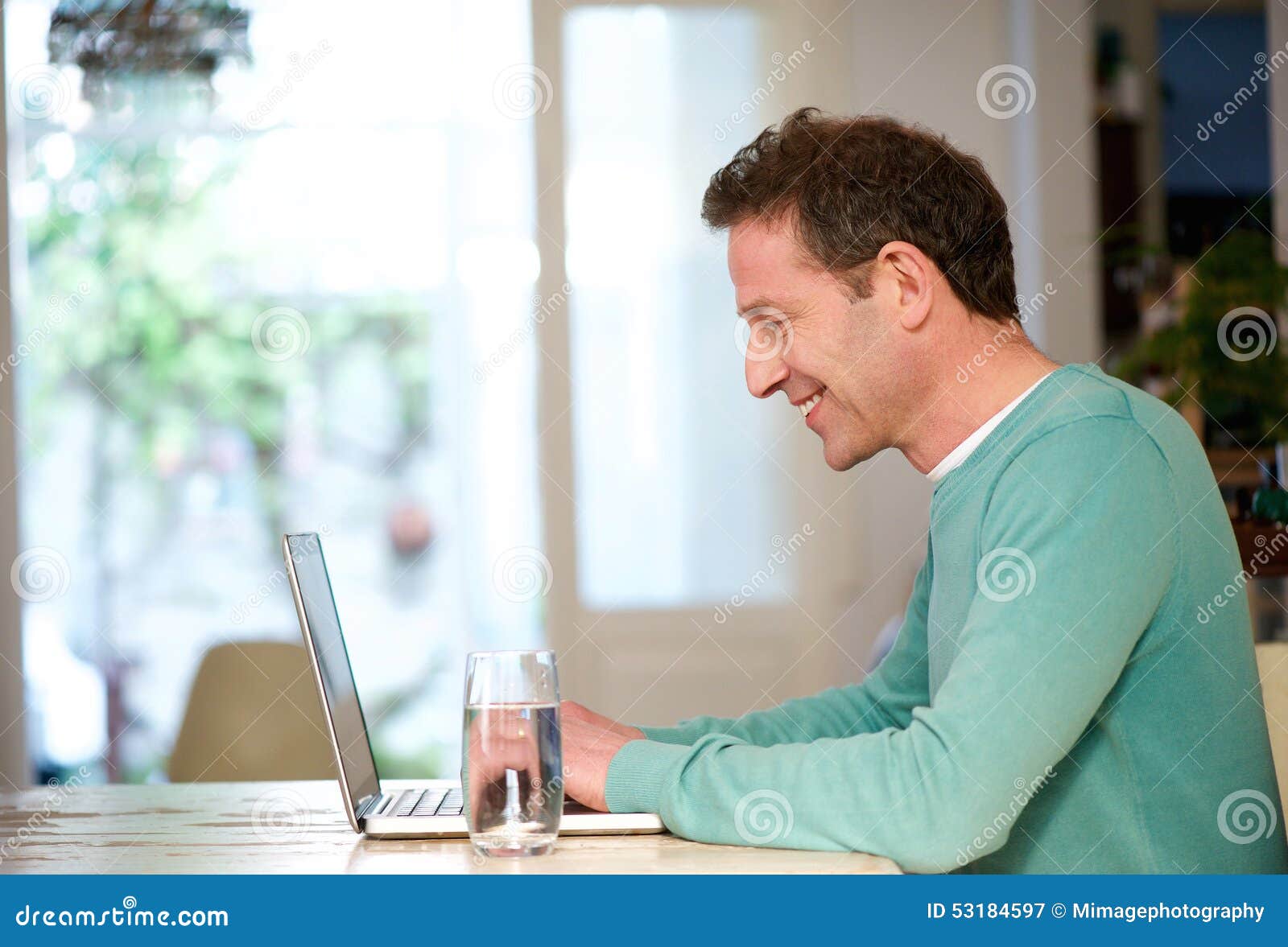 Happy Man Using Laptop at Home Stock Image - Image of looking, business ...