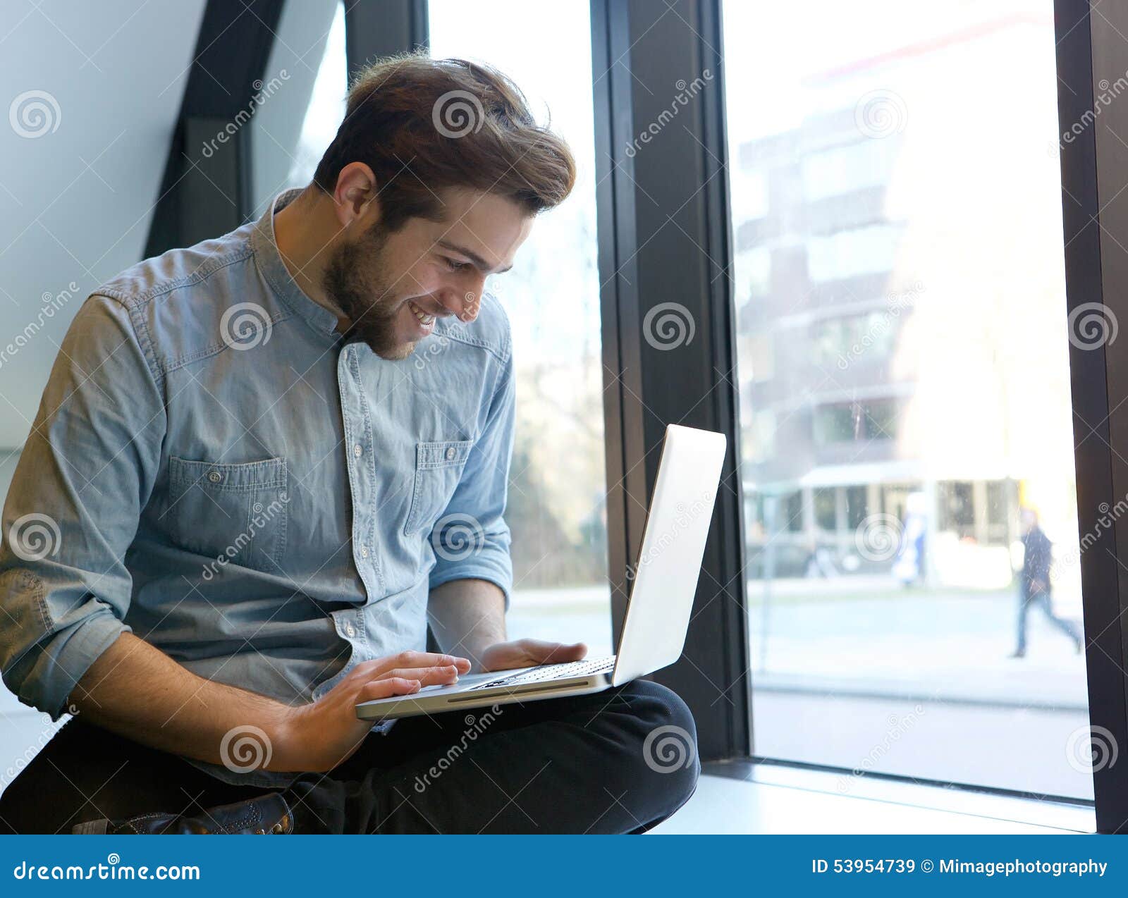 Happy man using laptop stock image. Image of adult, browsing - 53954739