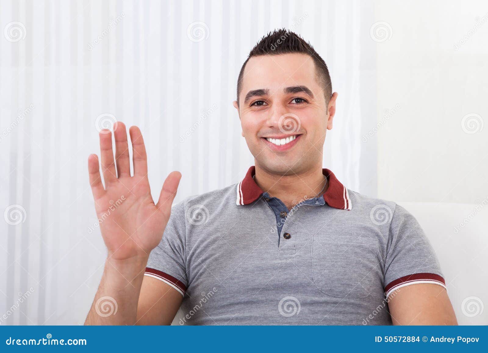 Happy man waving at home stock photo. Image of horizontal - 50572884