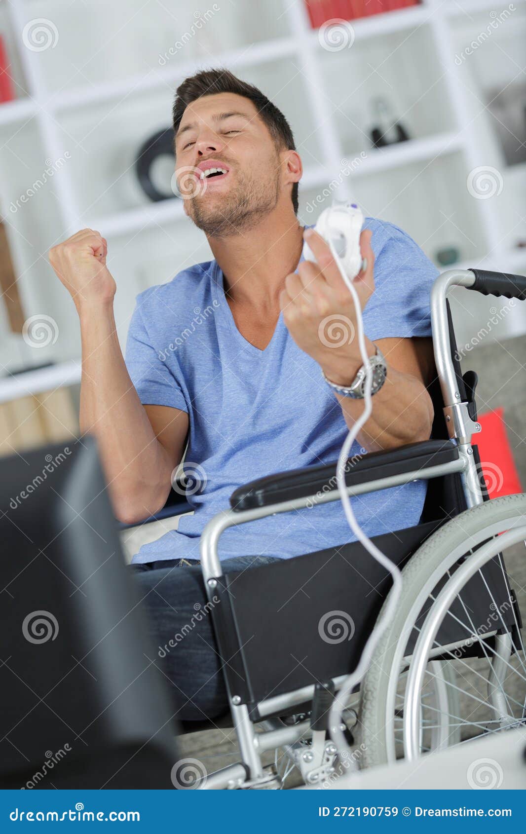 Happy Man in Wheelchair Making Victory Gesture for Computer Game Stock ...