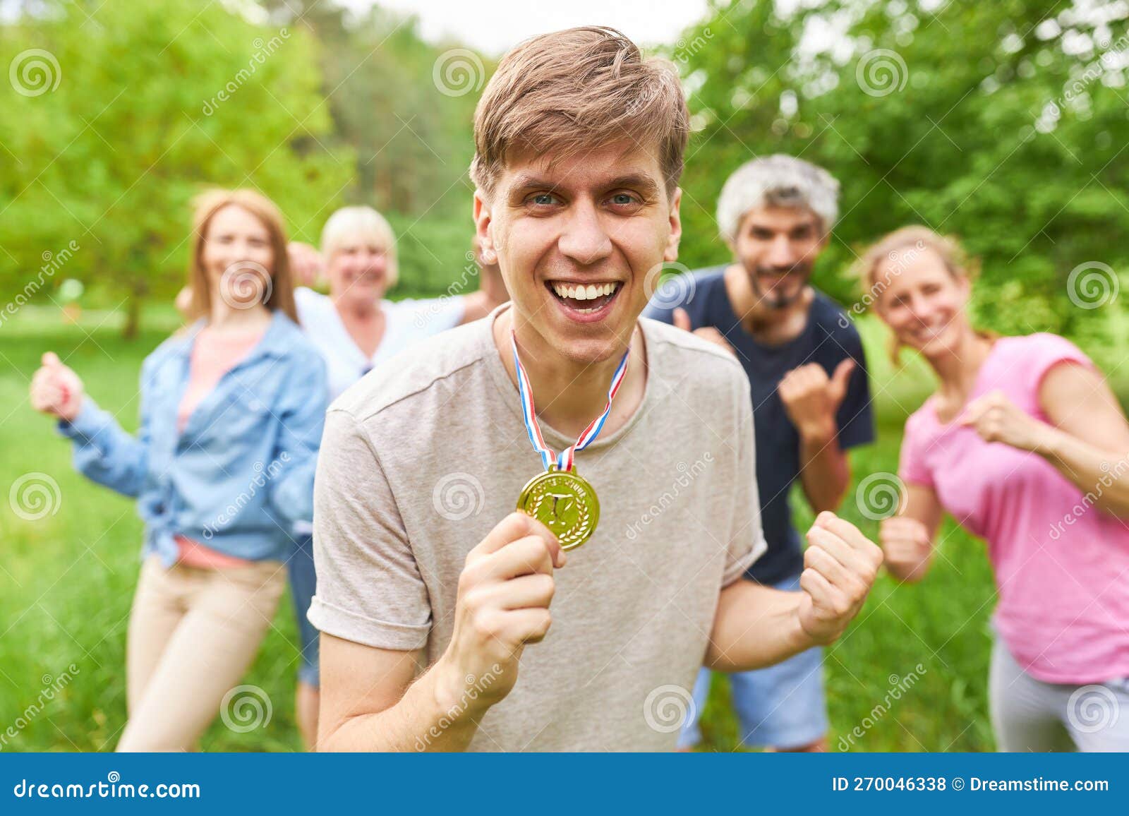 Happy Man with Winner Medal in Front of His Team Stock Photo - Image of ...