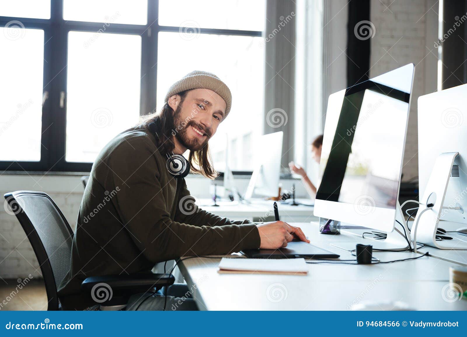 Happy Man Work in Office Using Computer. Looking at Camera Stock Photo ...