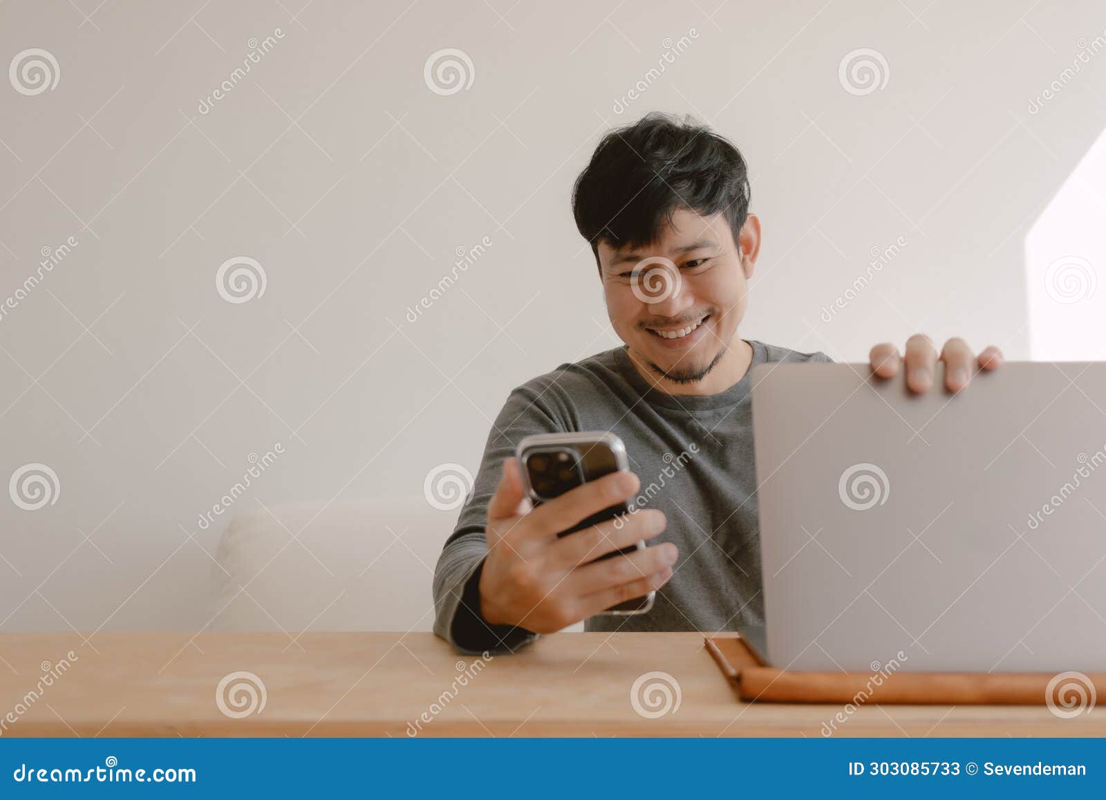 Happy Man Working on Computer Feeling Happy with the App in Mobile ...