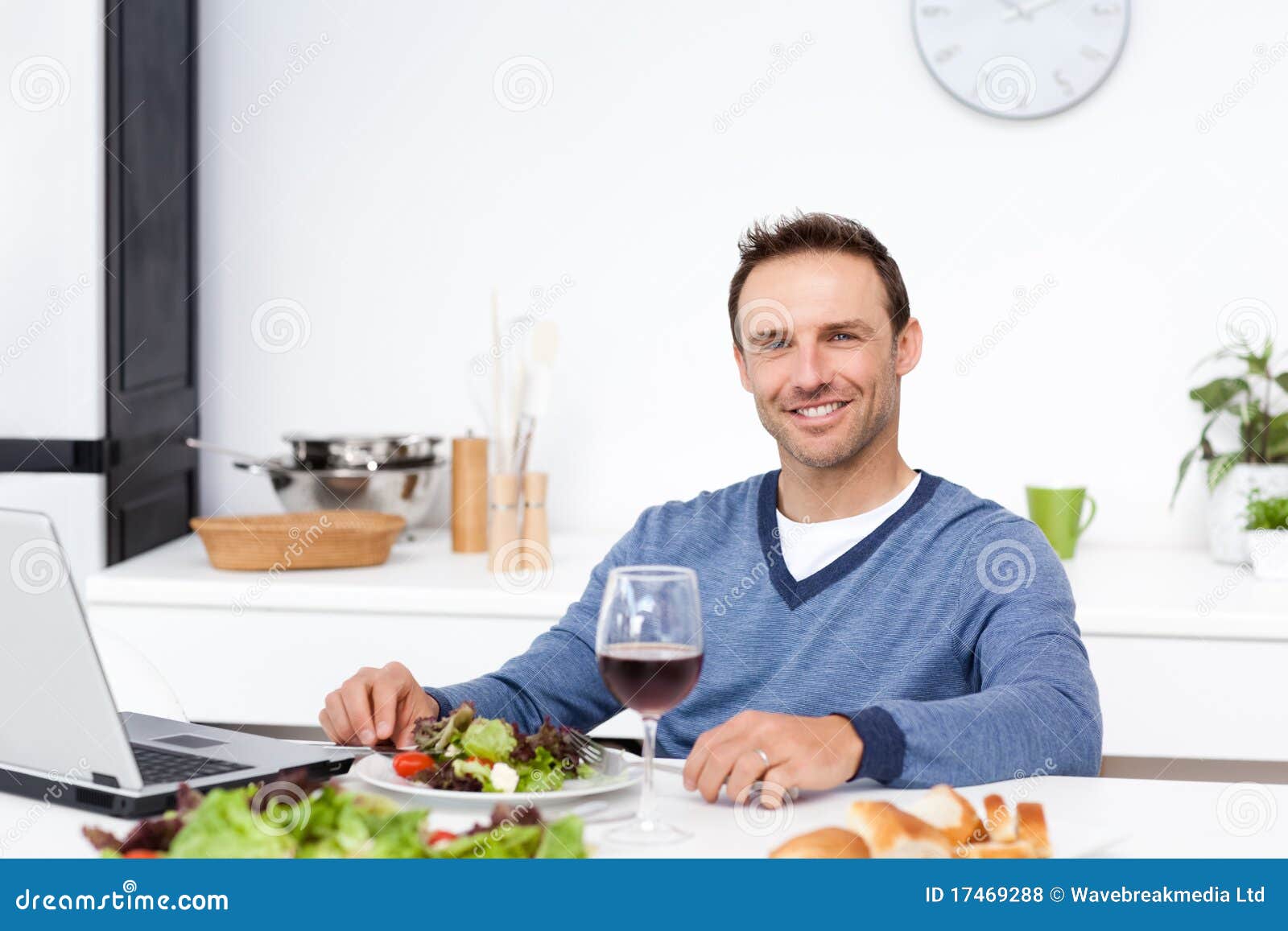 Happy Man Working on His Laptop while Having Lunch Stock Photo - Image ...