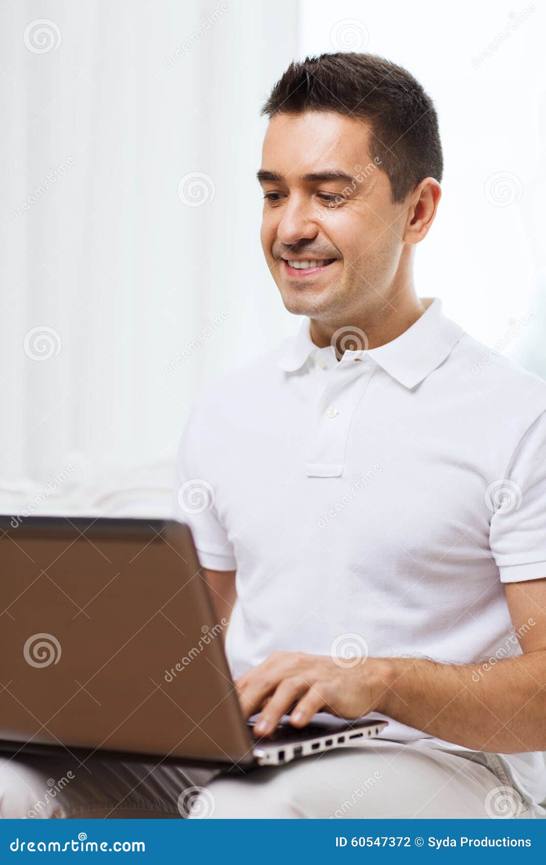 Happy Man Working with Laptop Computer at Home Stock Photo - Image of ...