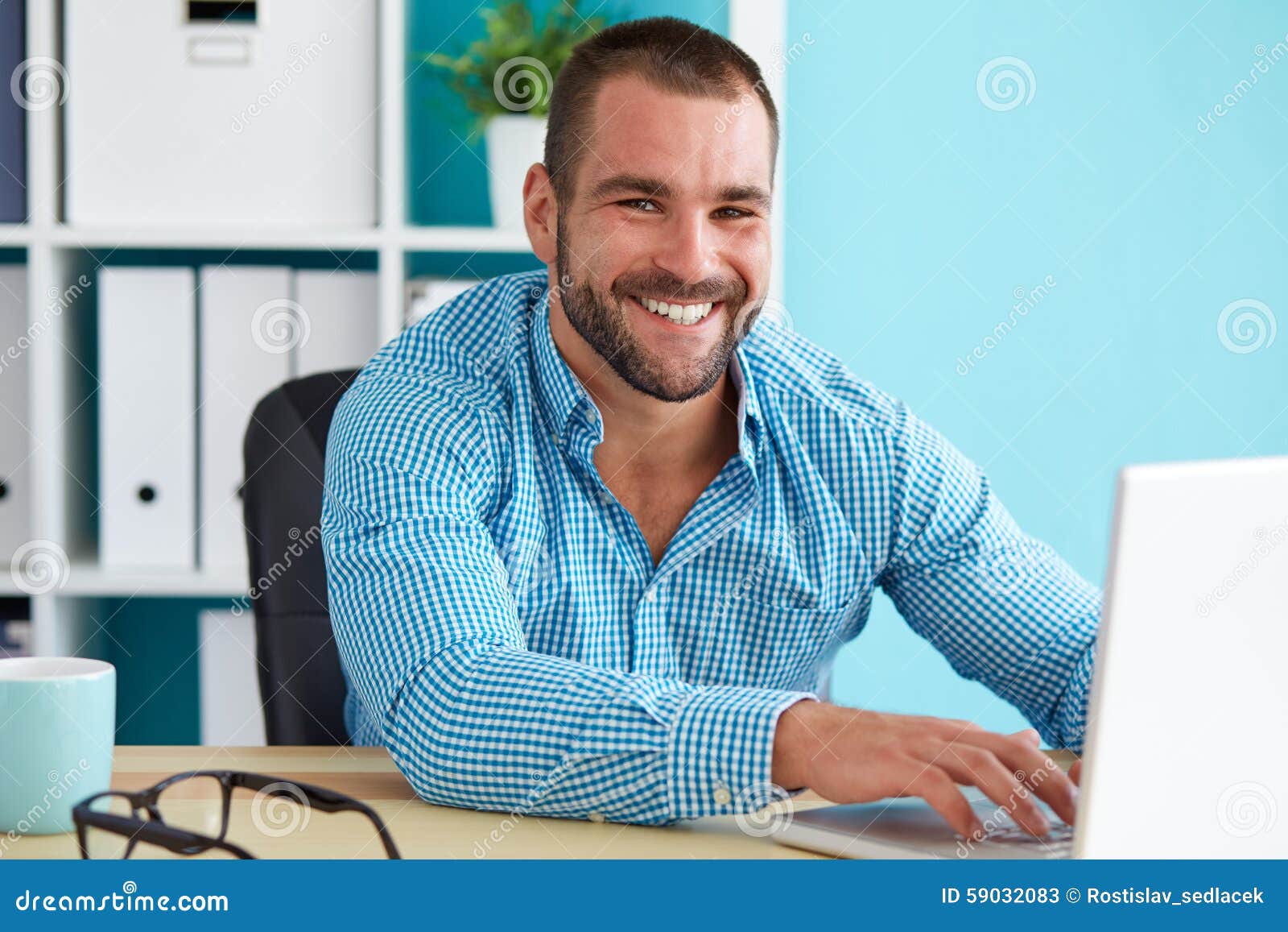 Happy Man Working in Office Stock Image - Image of adult, smiling: 59032083