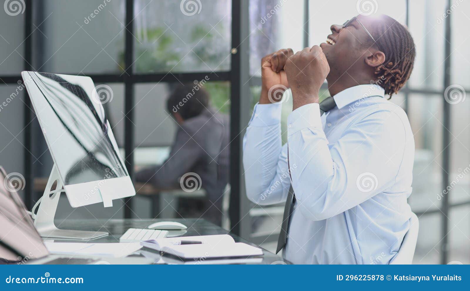 Happy Man Working in the Office. Raised His Hands Joyfully Stock Photo ...