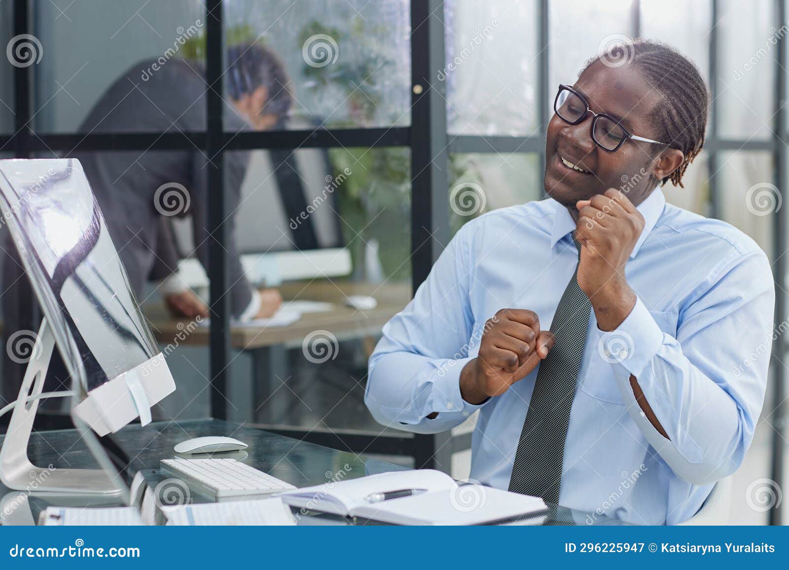 Happy Man Working in the Office. Raised His Hands Joyfully Stock Image ...