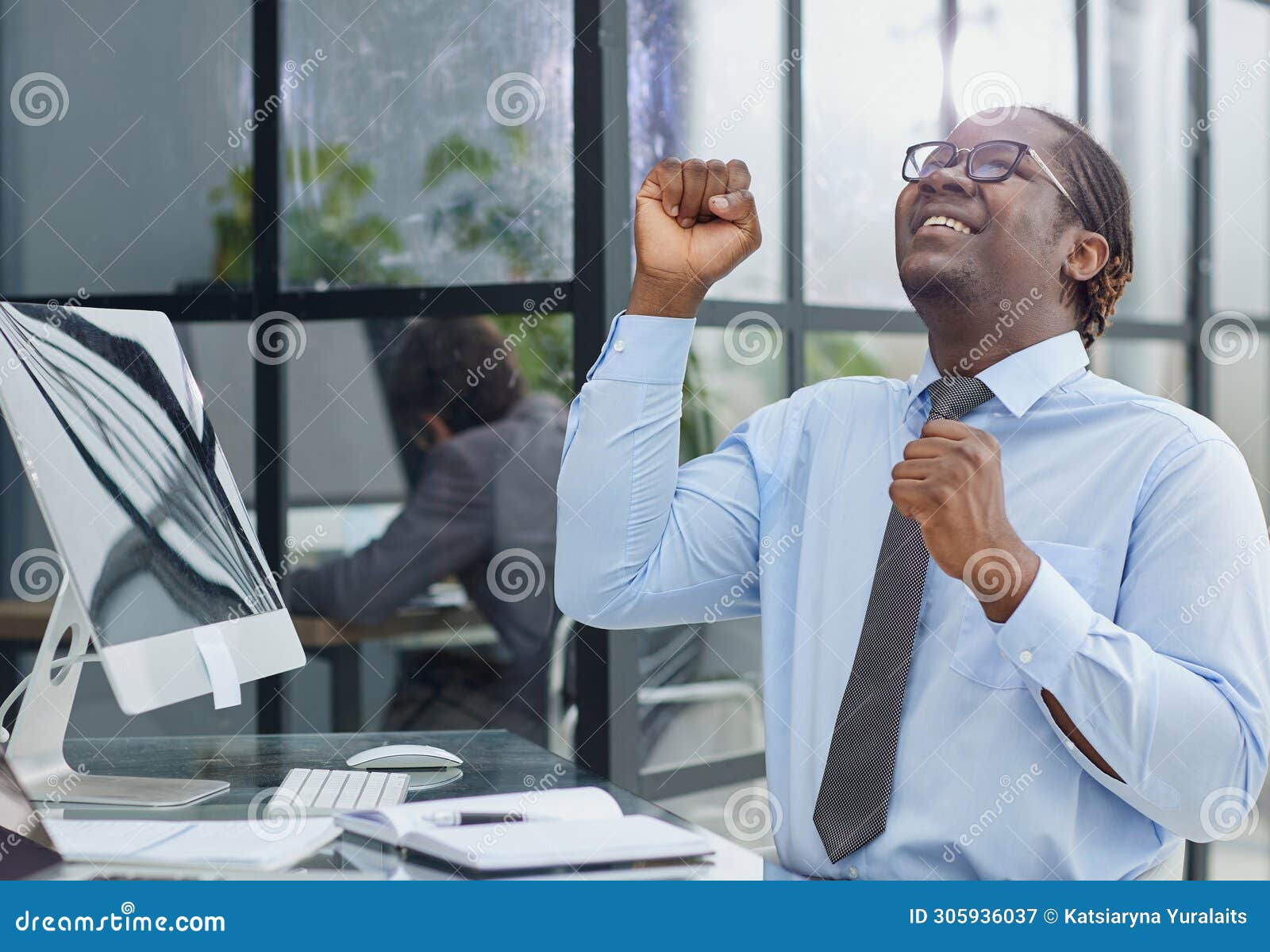 Happy Man Working in the Office. Raised His Hands Joyfully Stock Image ...