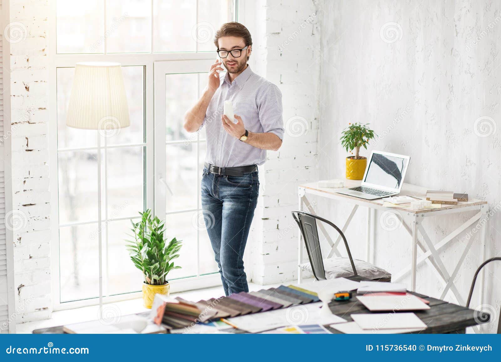 Happy Manager Discussing Work on the Phone Stock Photo - Image of ...