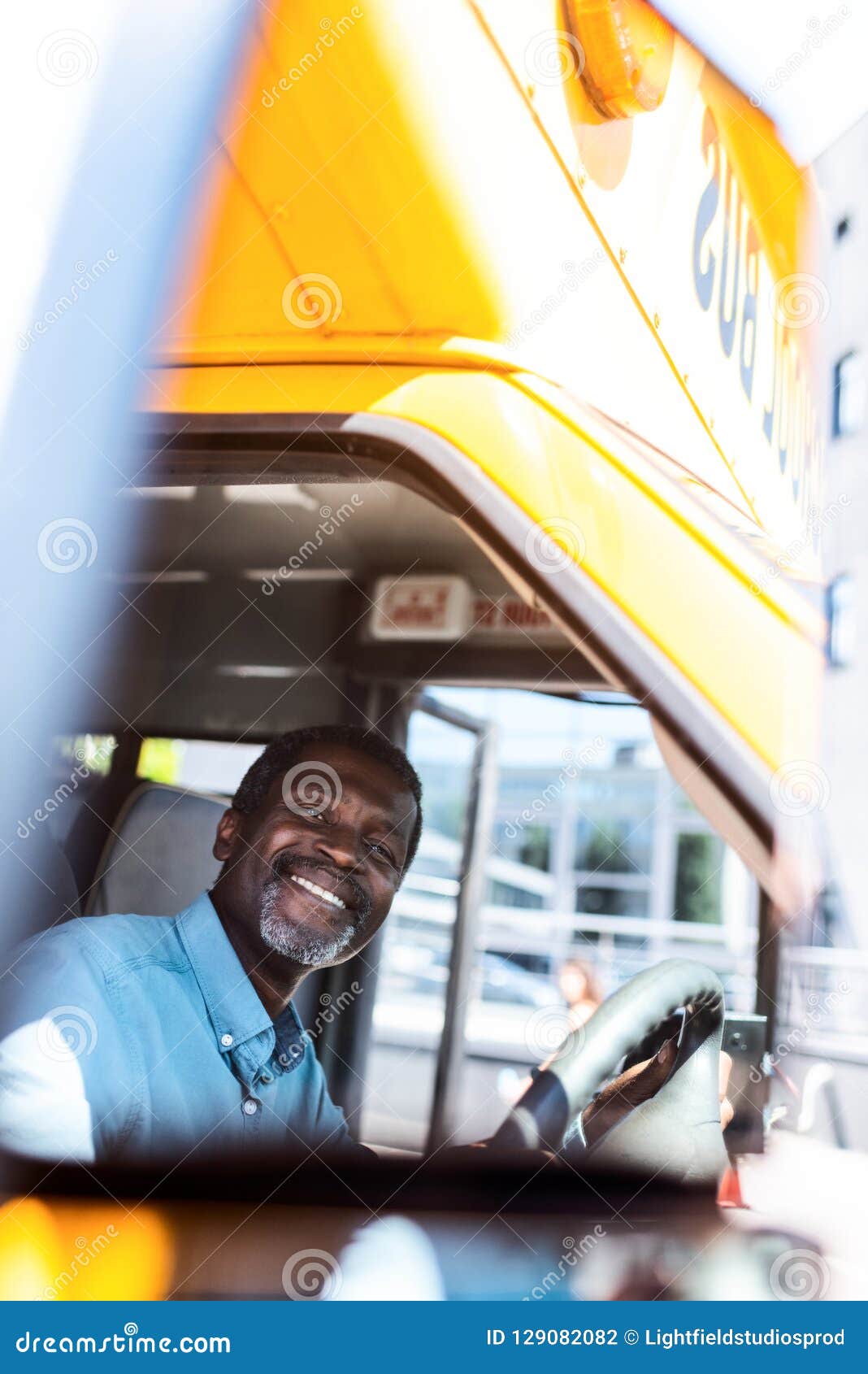 Happy Mature African American Bus Driver Looking Stock Photo - Image of ...