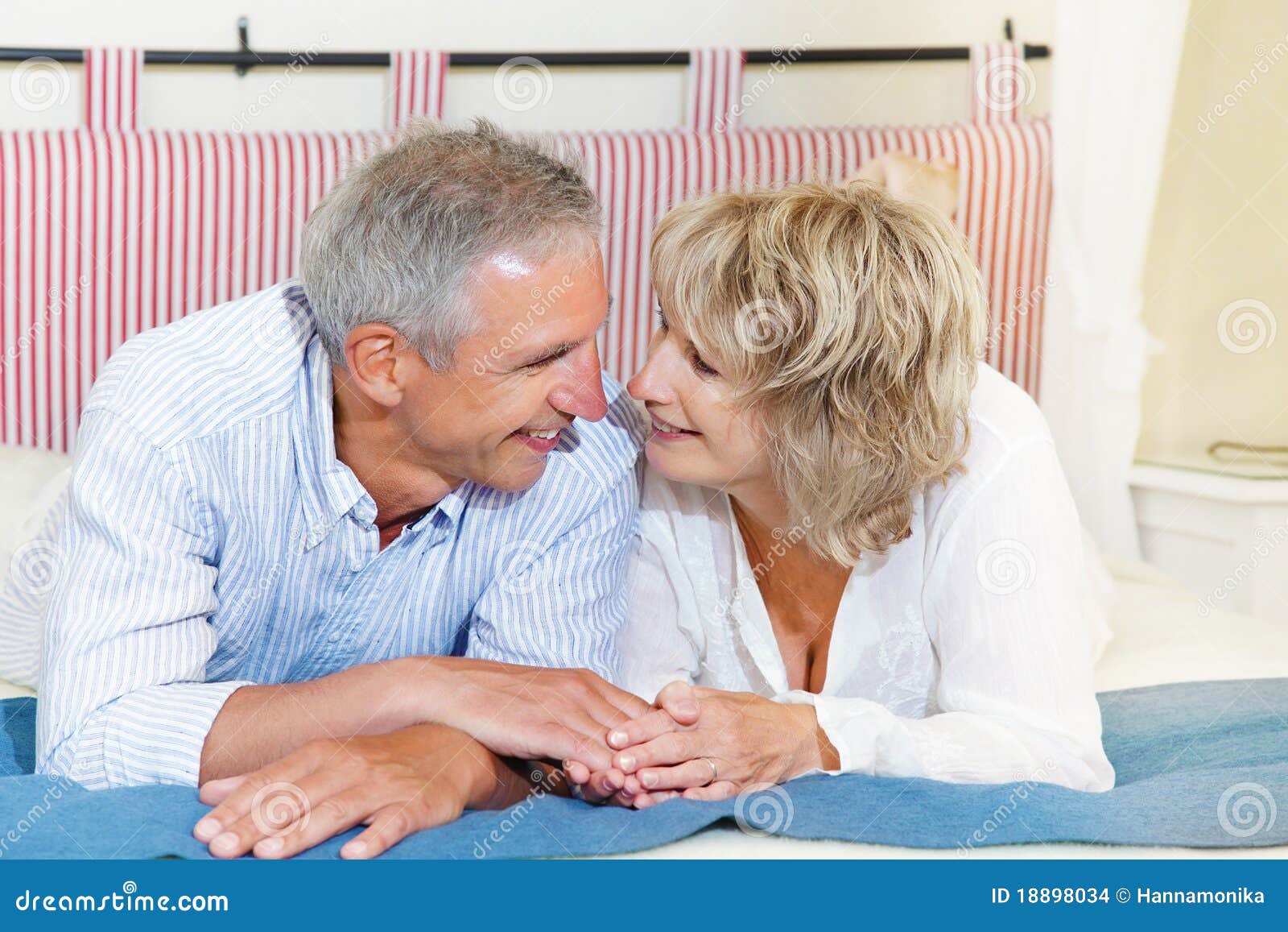 Happy Mature Couple at Home Stock Photo - Image of elderly, adult: 18898034