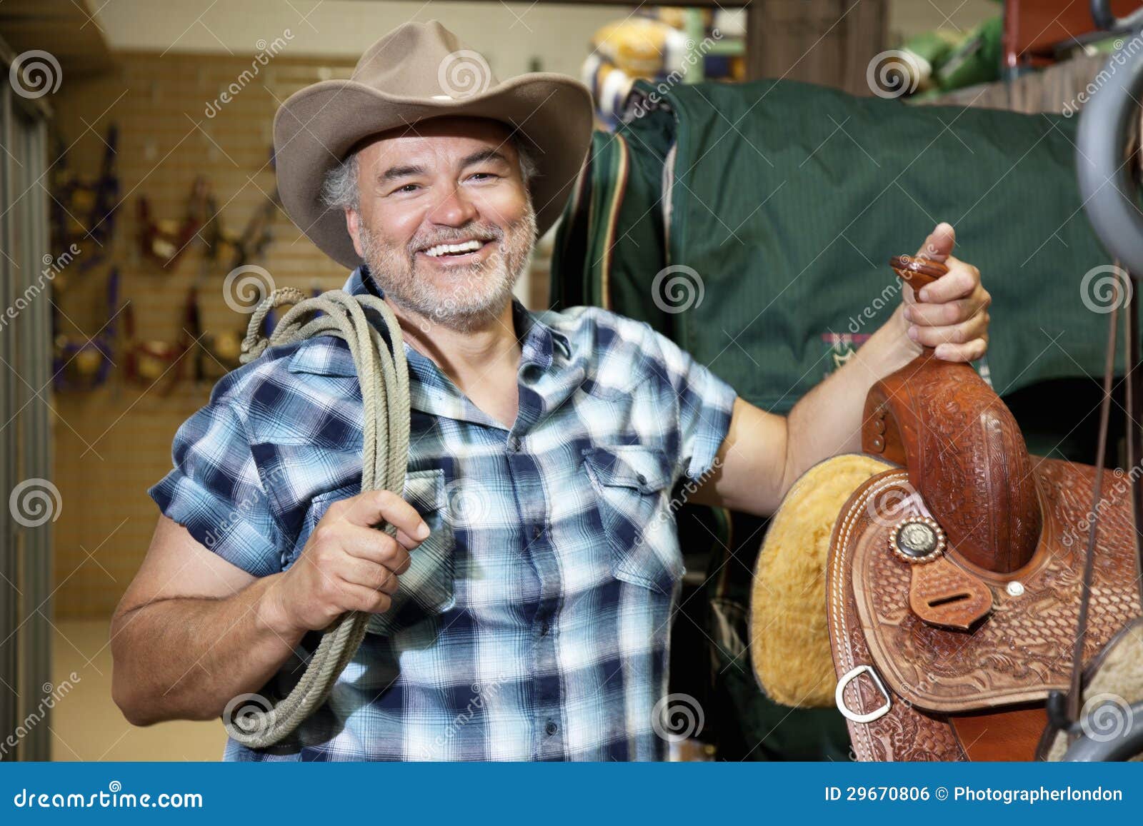 Mature Cowboy Looking Up At Weight Scale Royalty-Free Stock Photography ...