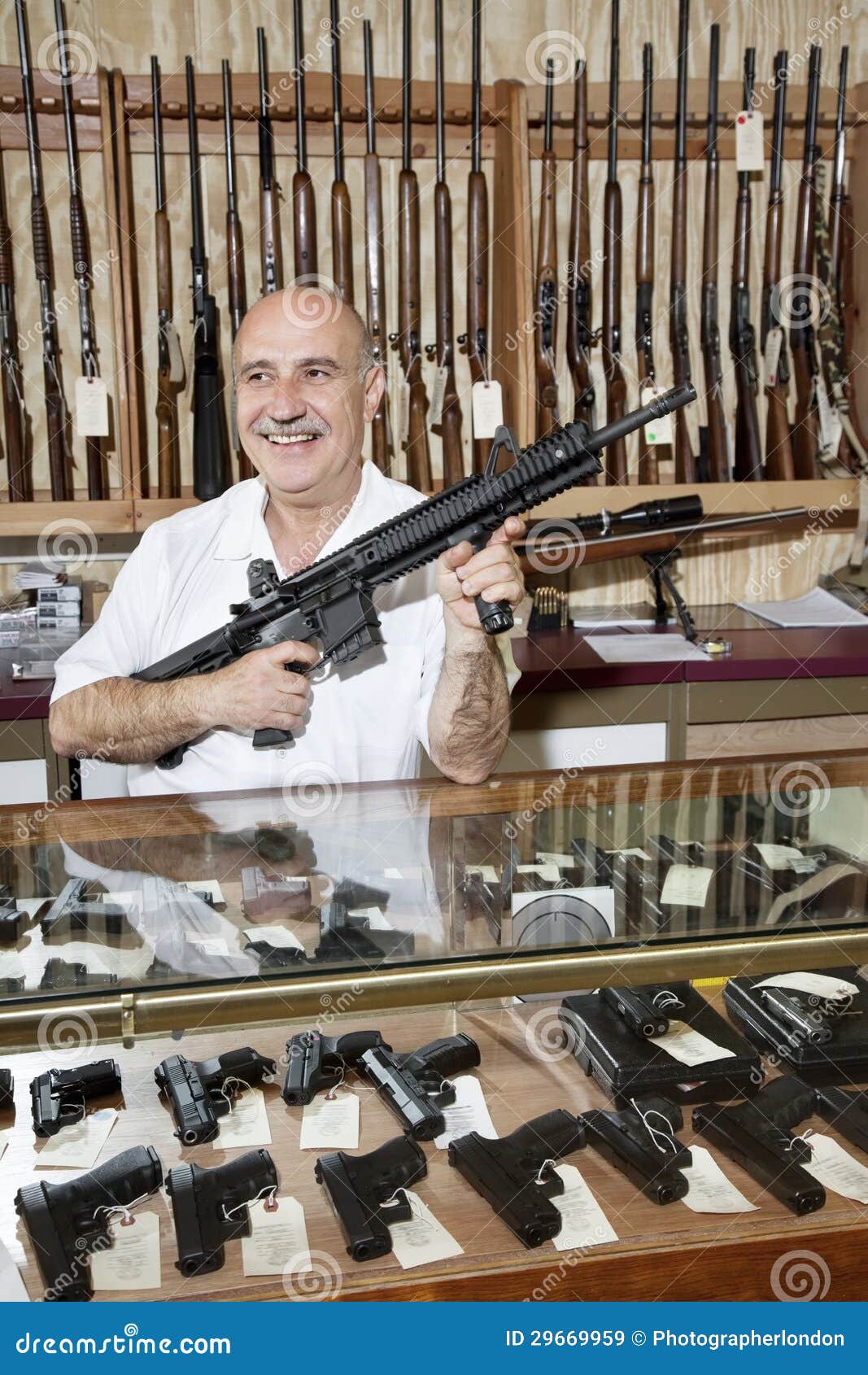 Happy Mature Man with Rifle in Gun Store Stock Image - Image of ...