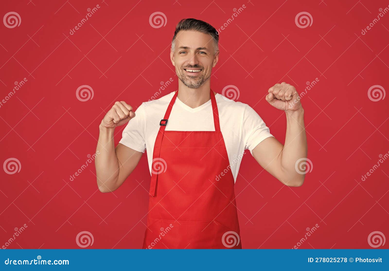 Happy Mature Man Waiter in Apron on Red Background Stock Photo - Image ...