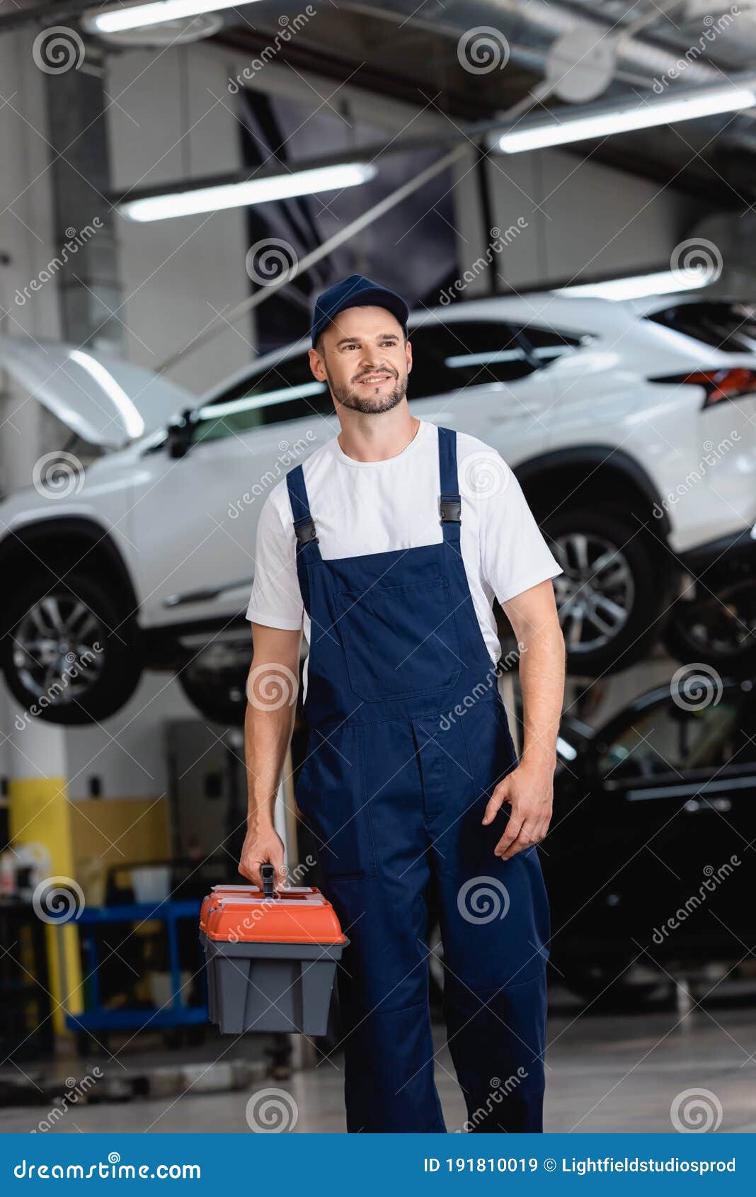 Happy Mechanic in Overalls and Cap Stock Image - Image of equipment ...