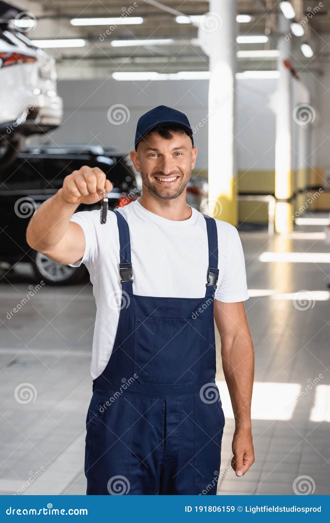 Happy Mechanic in Uniform and Cap Stock Image - Image of specialist ...