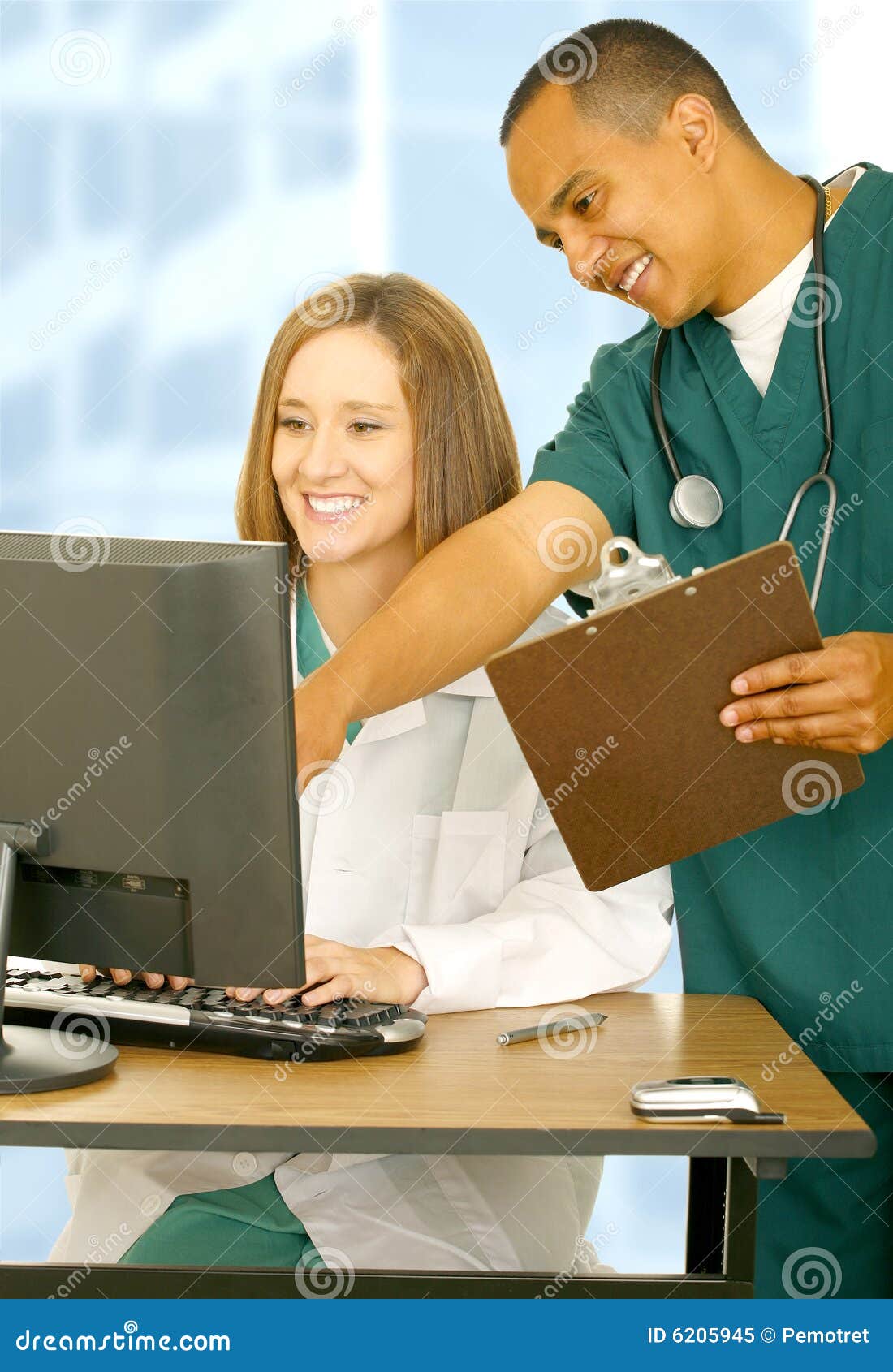 Happy Medical Staff Working Together Stock Image - Image of light ...