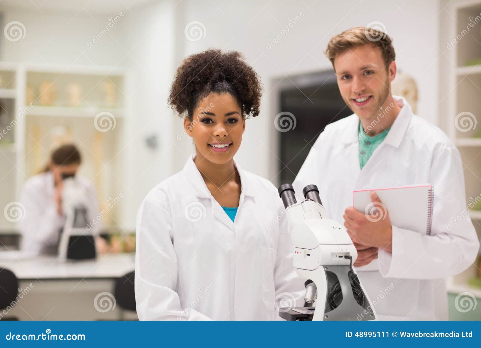 Happy Medical Students Working with Microscope Stock Image - Image of ...
