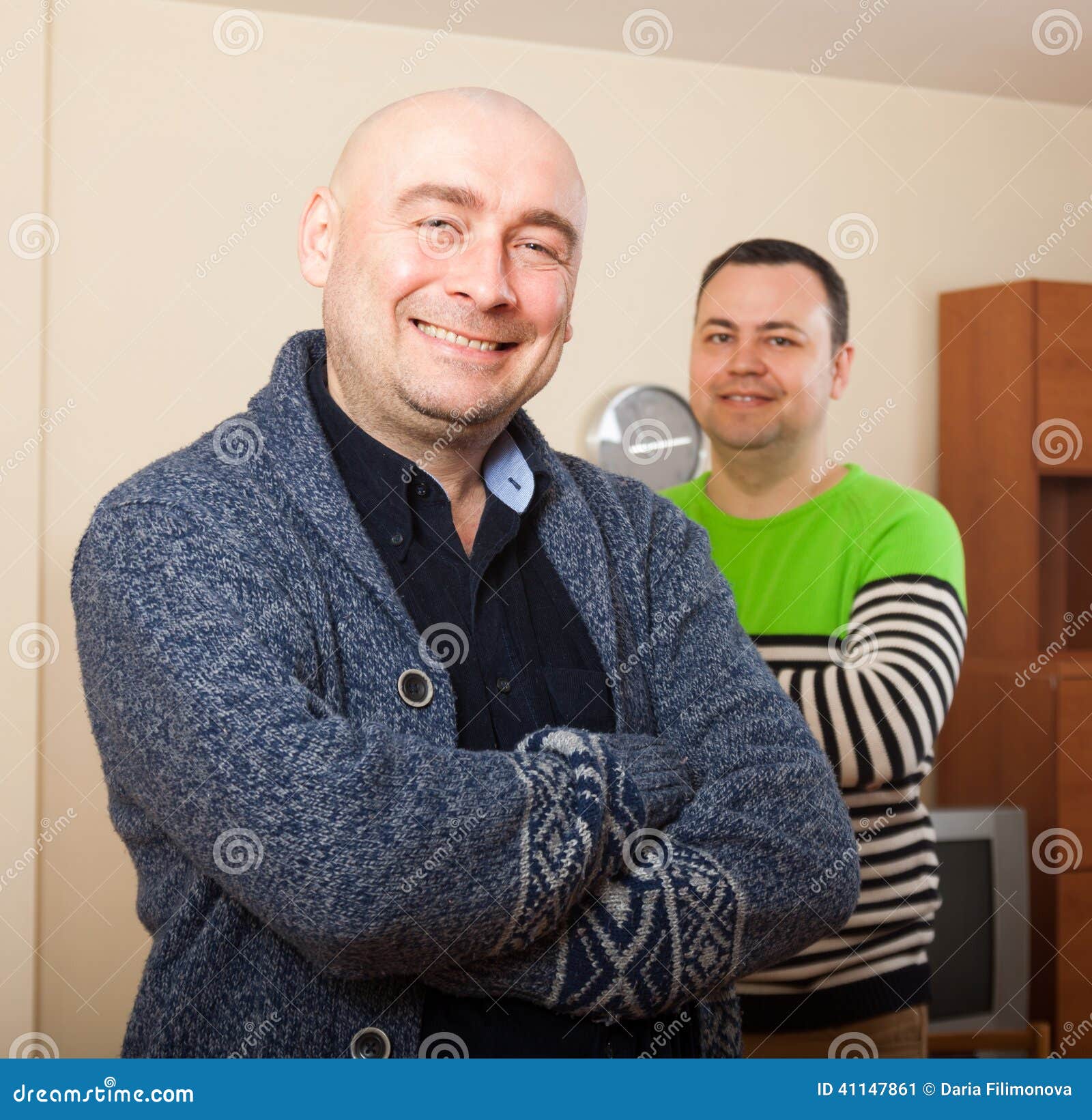 Happy men at home stock image. Image of room, inside - 41147861