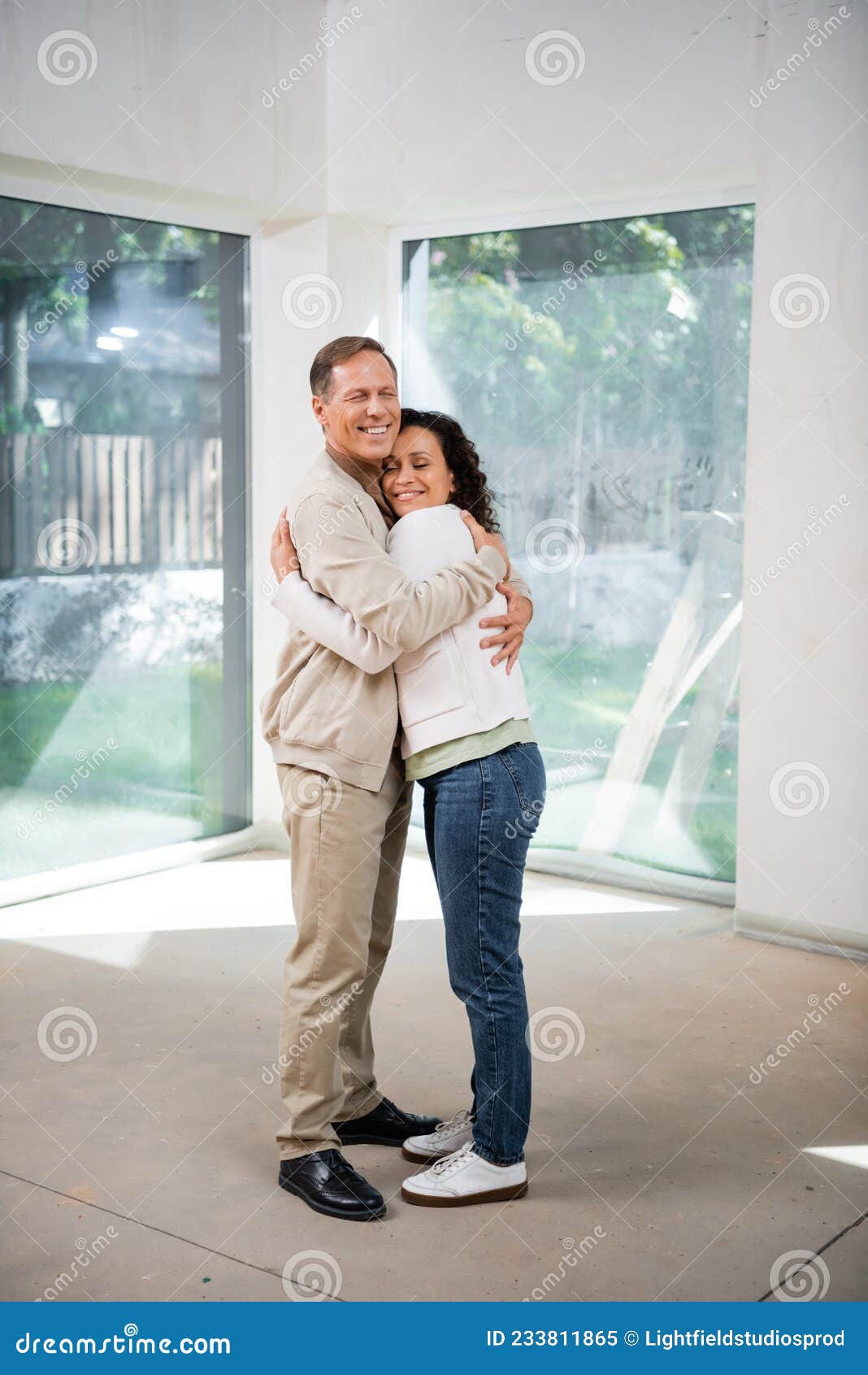 Happy Man Hugging African American Wife Stock Image Image Of Embrace