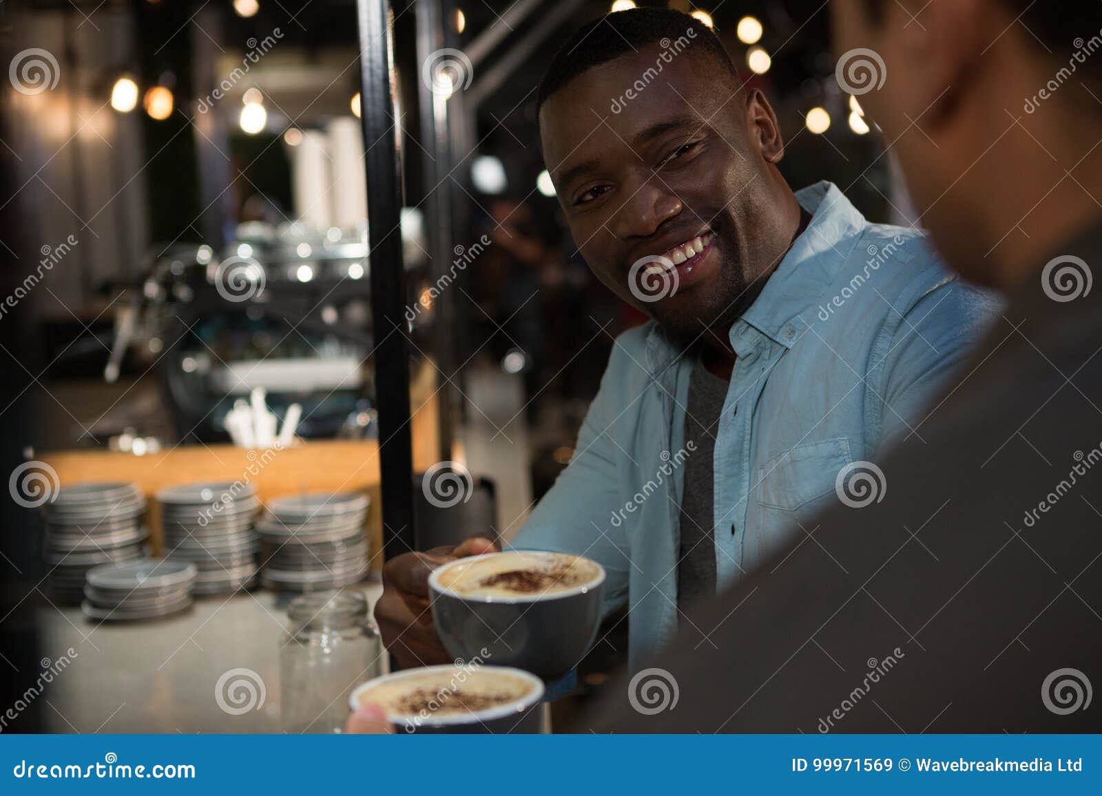 Happy Man Interacting while Having Coffee Stock Image - Image of ...