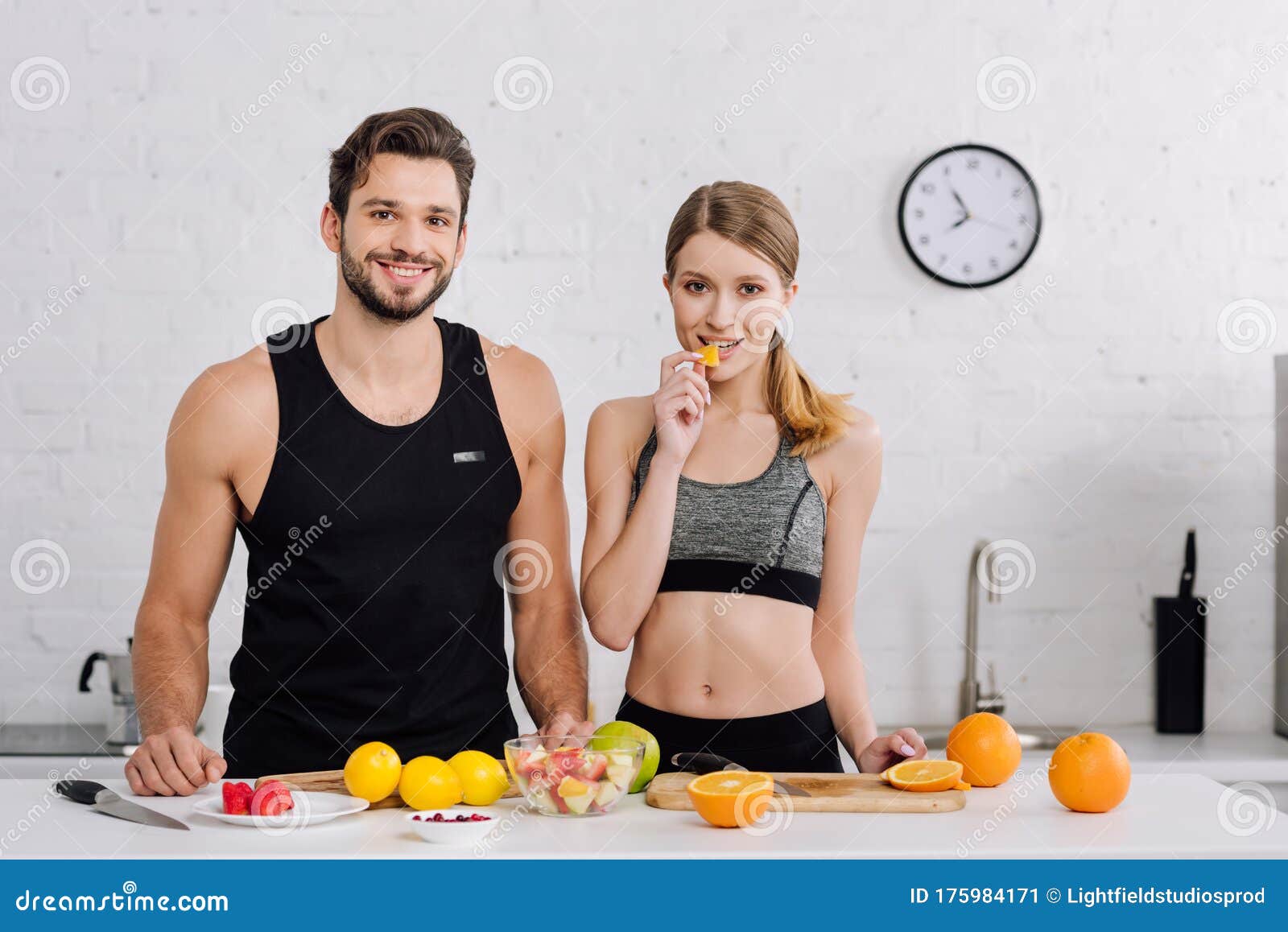 Man Smiling Near Woman Eating Sliced Stock Image - Image of sportive ... Man Smiling Near Woman Eating Sliced Stock Image - Image of sportive ...