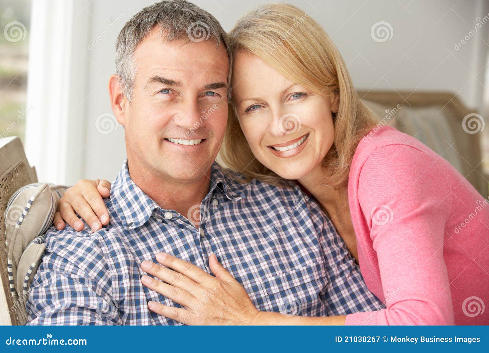 Happy Mid Age Couple at Home Stock Image - Image of home, looking: 21030267