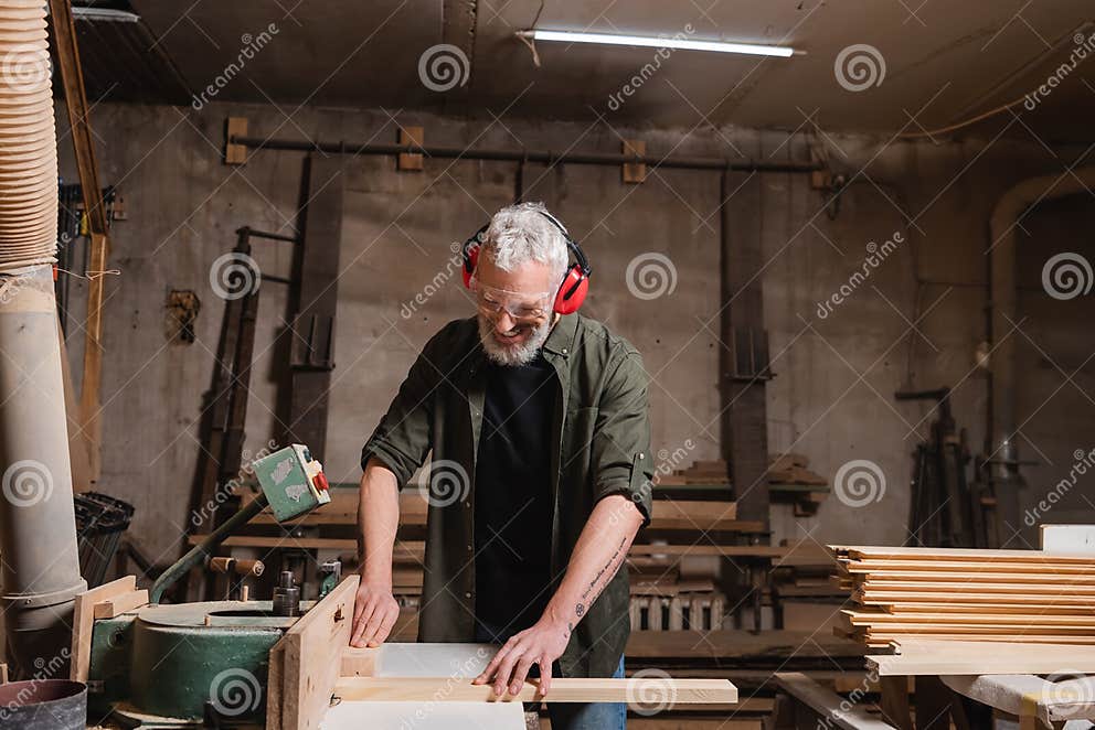 Happy Middle Aged Carpenter Working on Stock Photo - Image of equipment ...