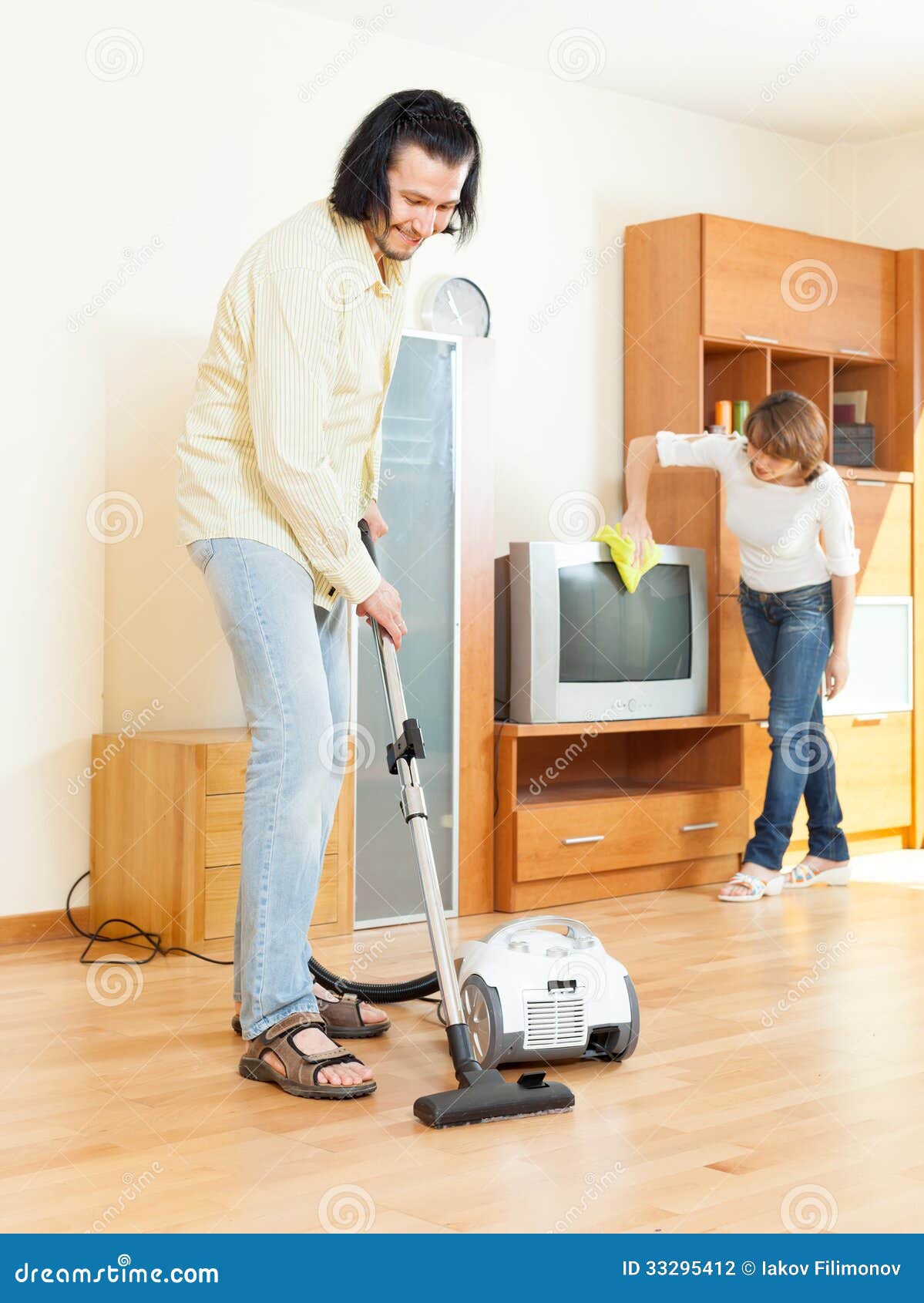 Happy Middle-aged Couple Doing Housework Stock Photo - Image of ...