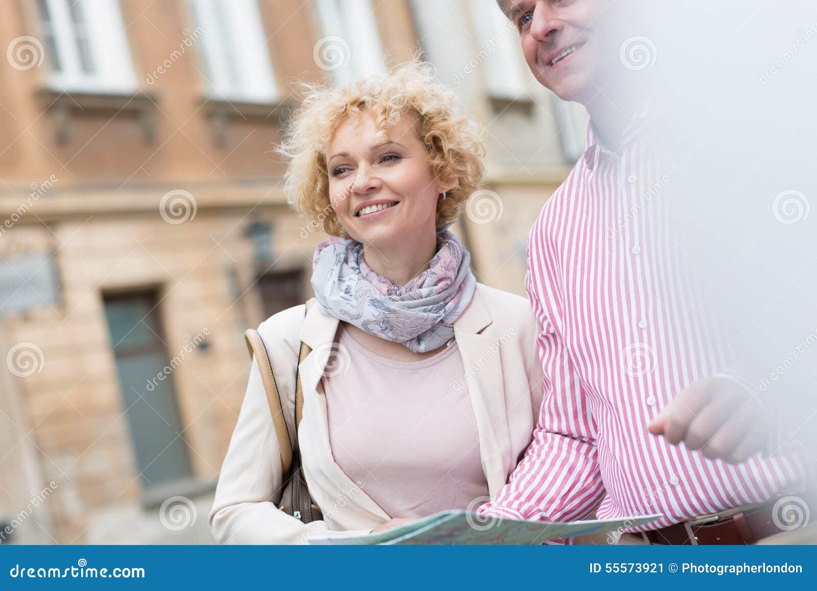 Happy Middle-aged Couple with Map in City Stock Image - Image of ...