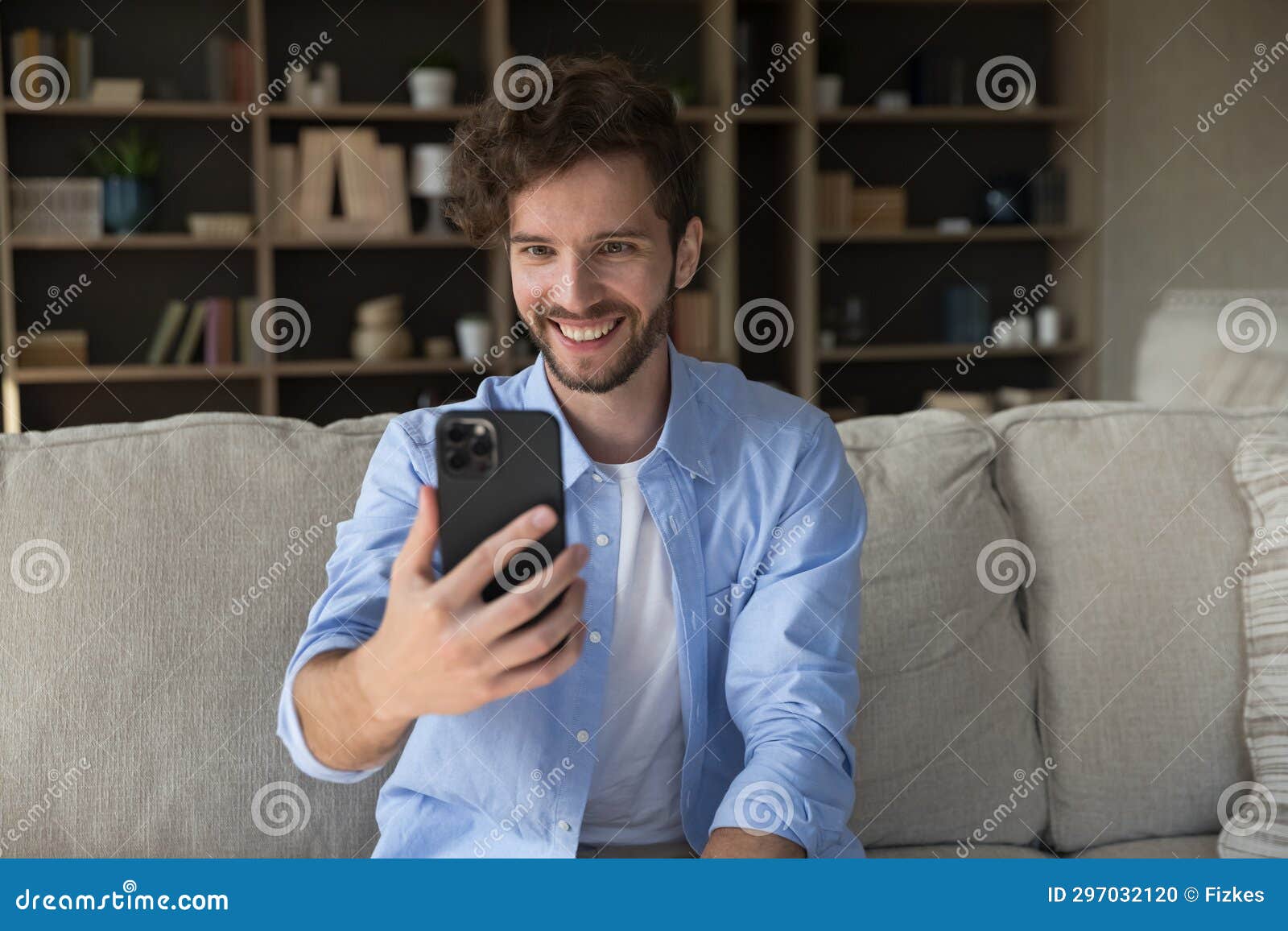 Happy Millennial Guy Enjoy Videocall Using Modern Tech and Application ...