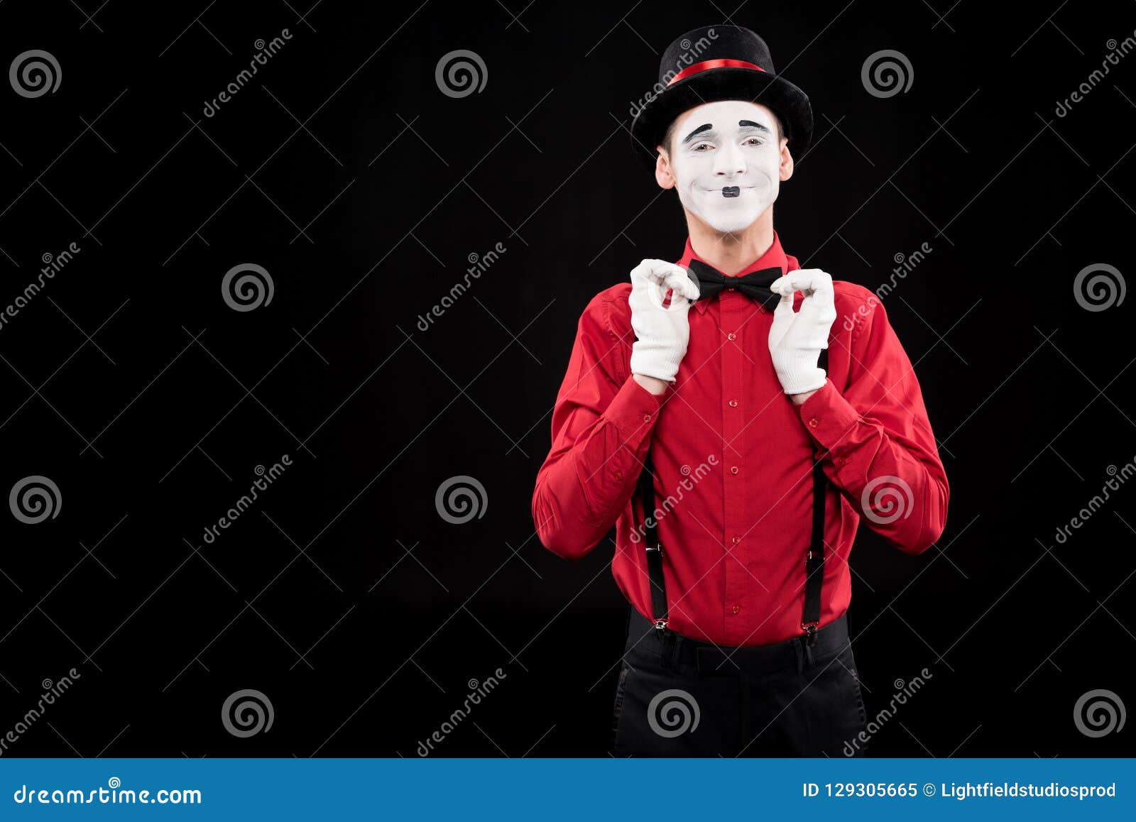 Happy mime fixing bow tie stock image. Image of comedy - 129305665