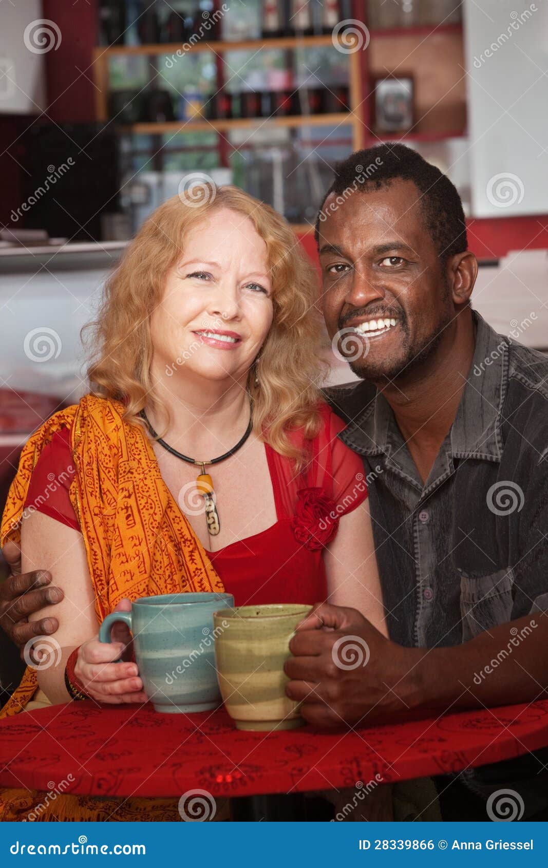 Happy Mixed Couple in Coffeehouse Stock Photo - Image of black ...